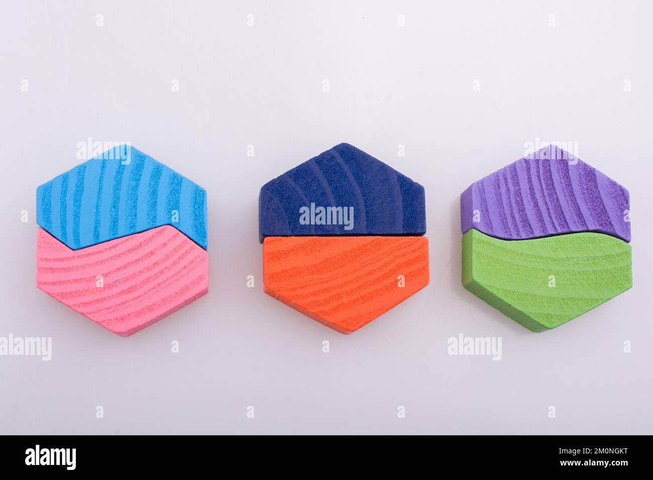 Colorful wooden pieces of a logic puzzle Stock Photo - Alamy