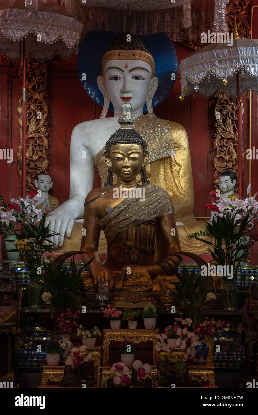 Beautiful Shan style Buddha subduing Mara statues in vihara at ancient ...