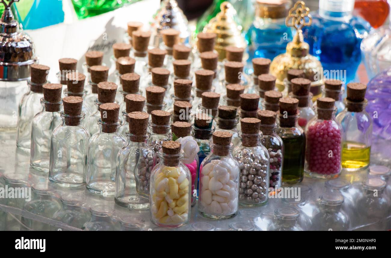 Set of Empty small transparent bottles filled with beads Stock Photo ...