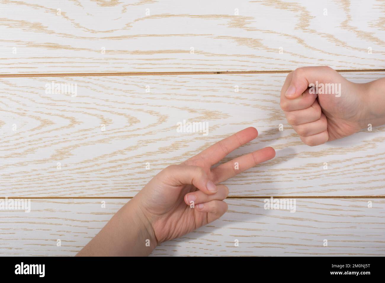 Hands rock paper scissors hi-res stock photography and images - Alamy