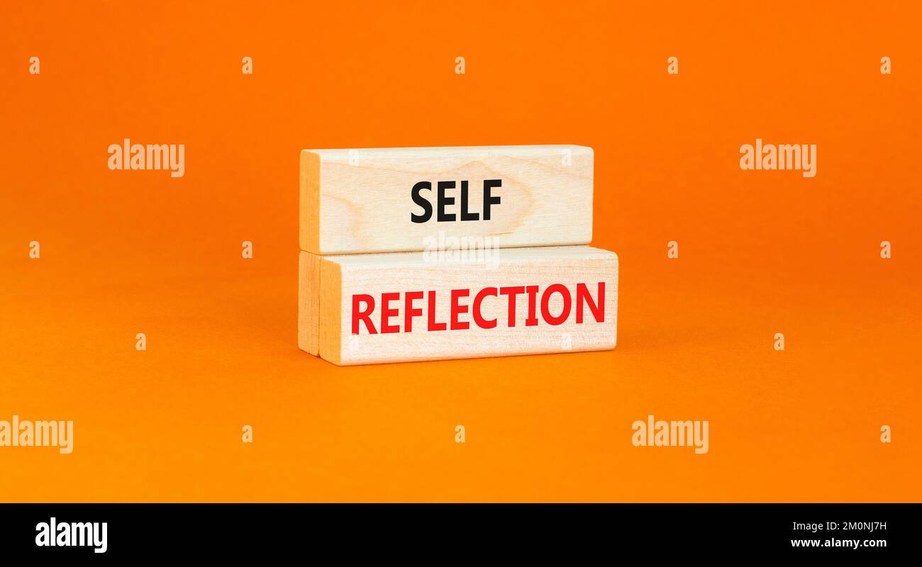 Self reflection symbol. Concept word Self reflection typed on wooden ...
