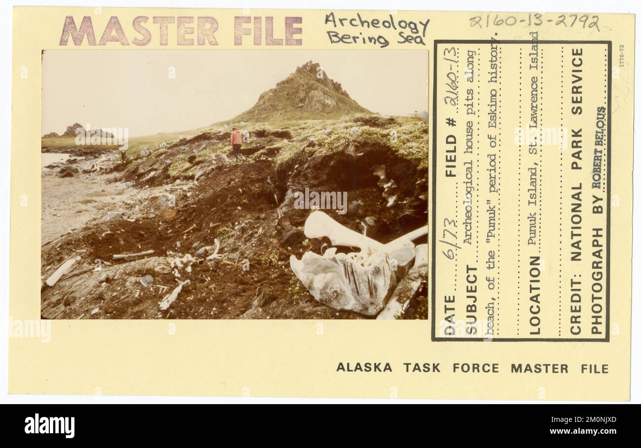 Archeological house pits along beach, of the "Punuk" period of Eskimo ...