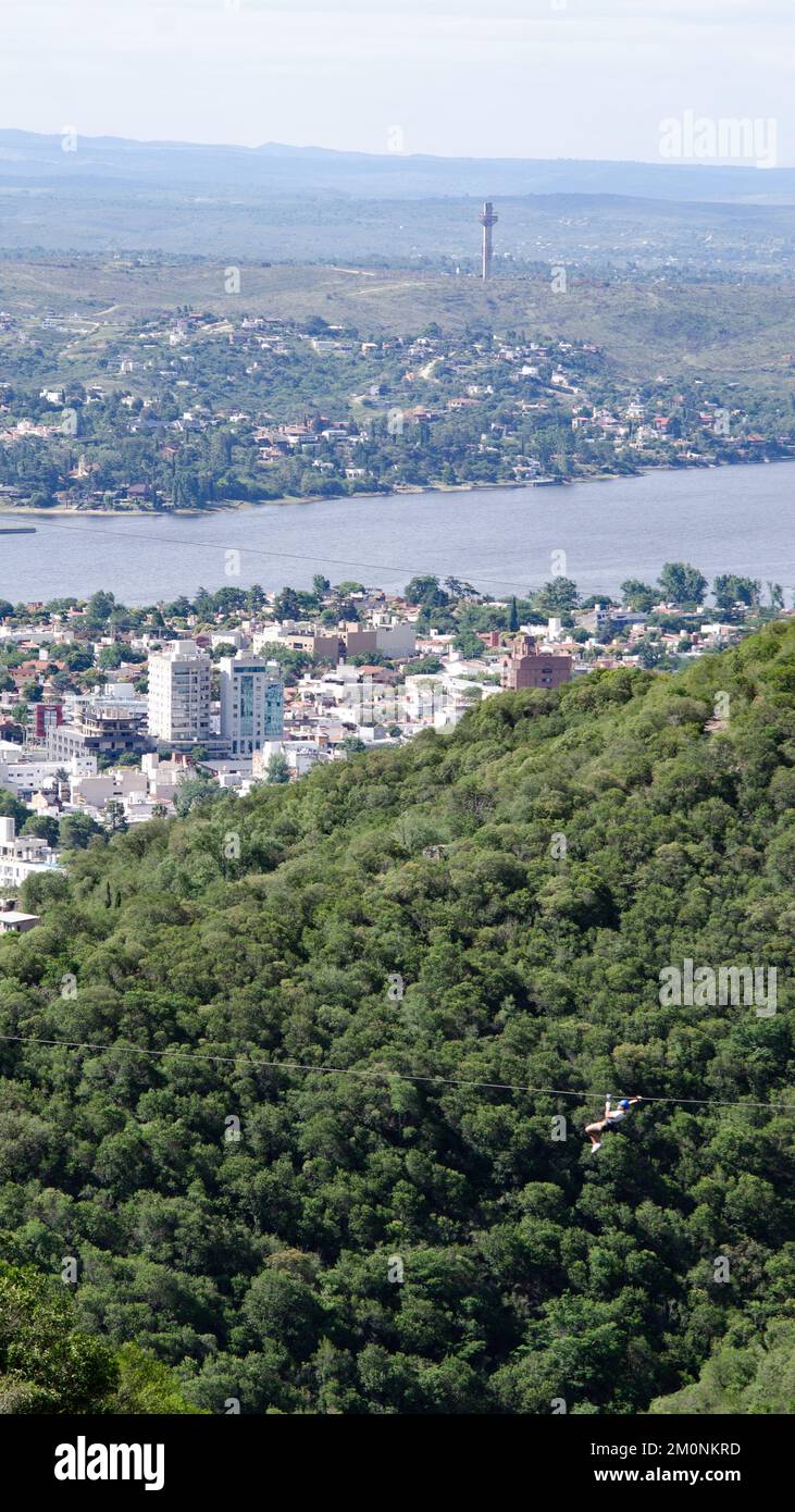 A beautiful green view to city shore buildings from rainforest mountain ...