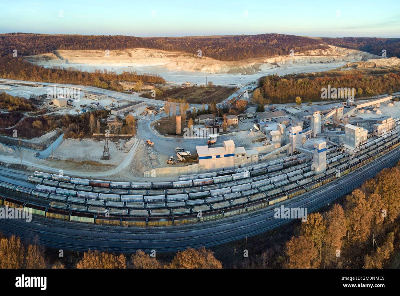Aerial view of cargo train loaded with crushed stone materials at ...