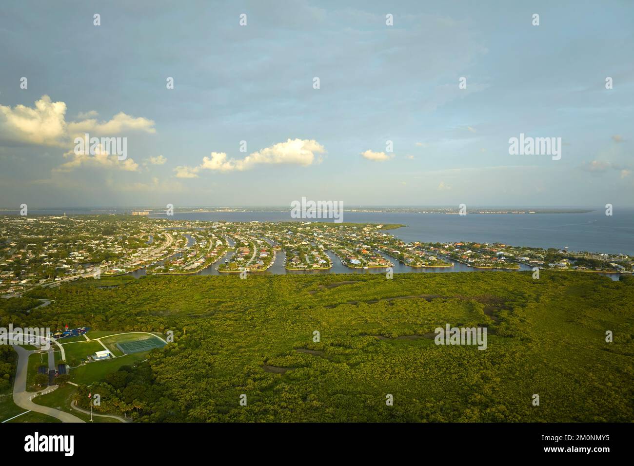 Aerial view of rural private houses in remote suburbs located near ...