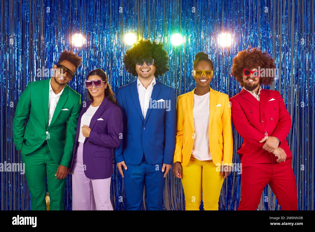 Happy laughing people in sunglasses in gangnam style on blue shiny ...