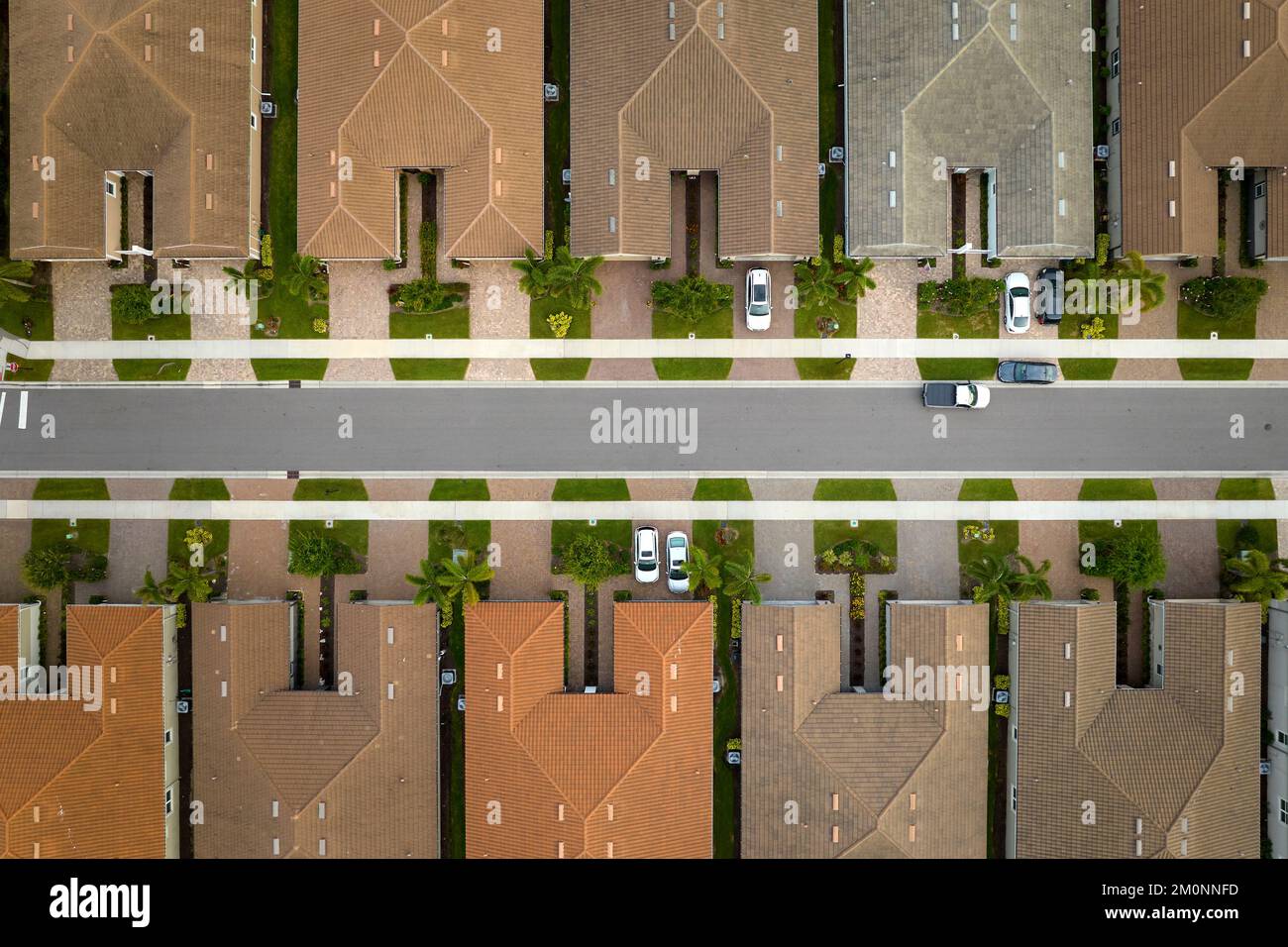 Aerial view of tightly located family houses in Florida closed suburban ...