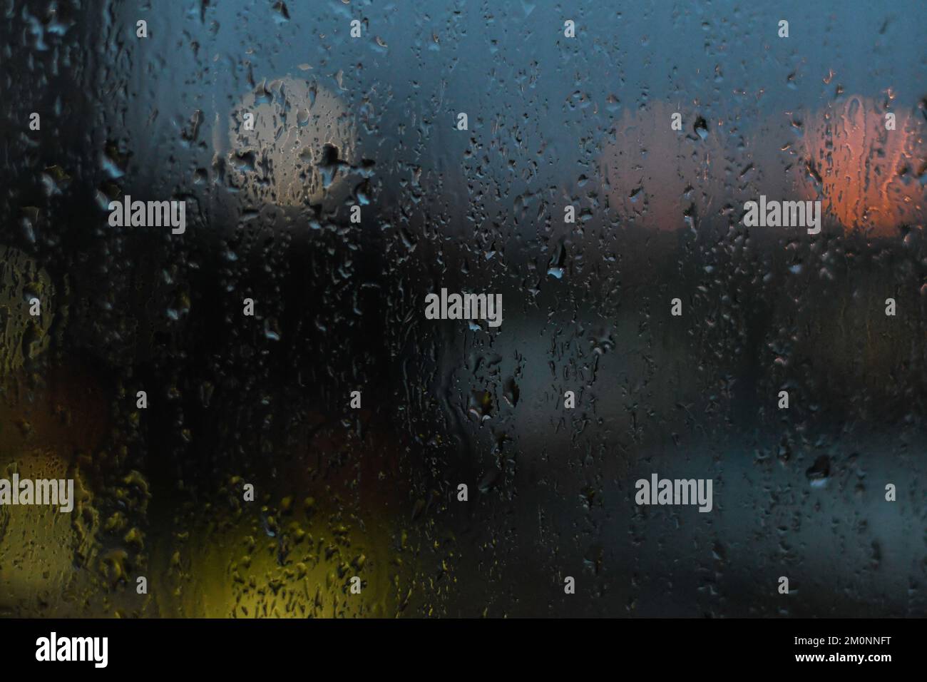 Raindrops falling on the window Stock Photo - Alamy