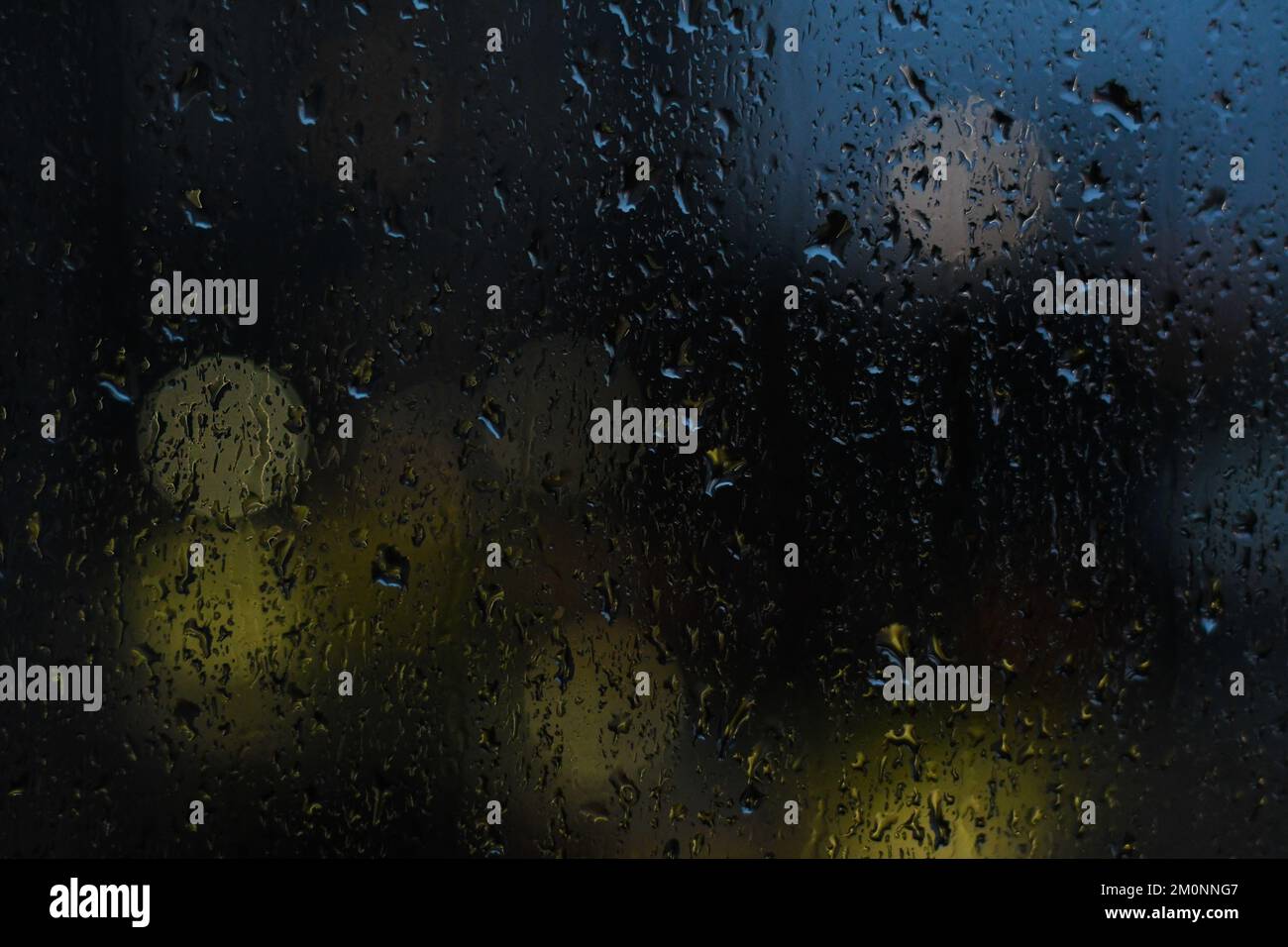 Raindrops falling on the window Stock Photo - Alamy