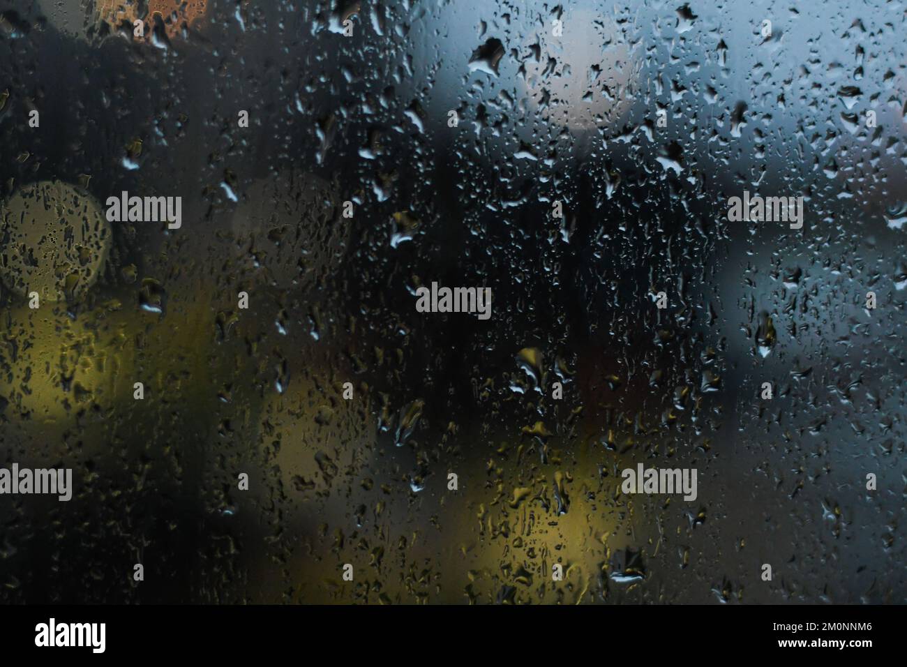 Raindrops falling on the window Stock Photo - Alamy