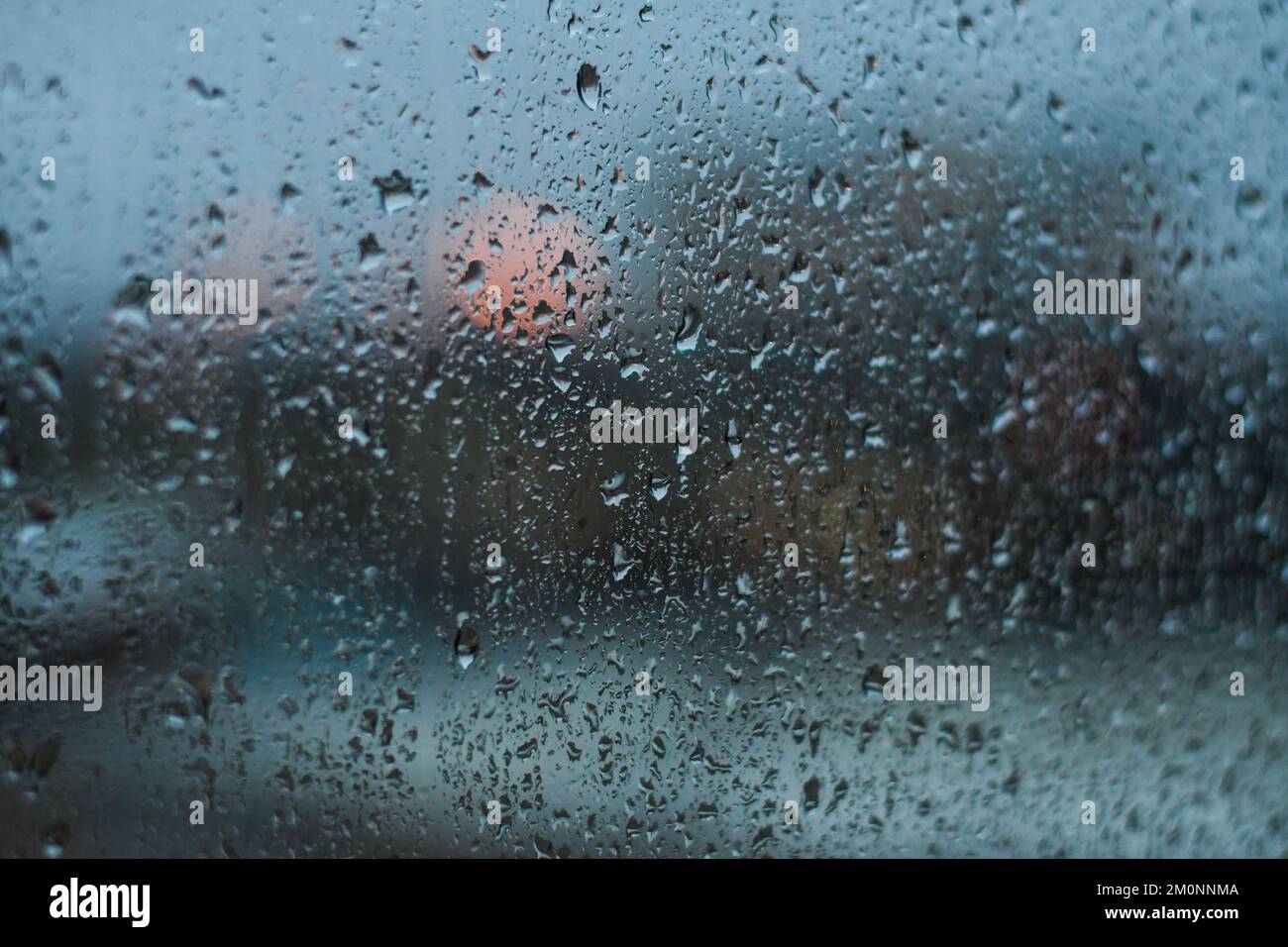 Raindrops falling on the window Stock Photo - Alamy