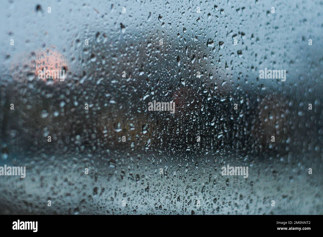 Raindrops falling on the window Stock Photo - Alamy