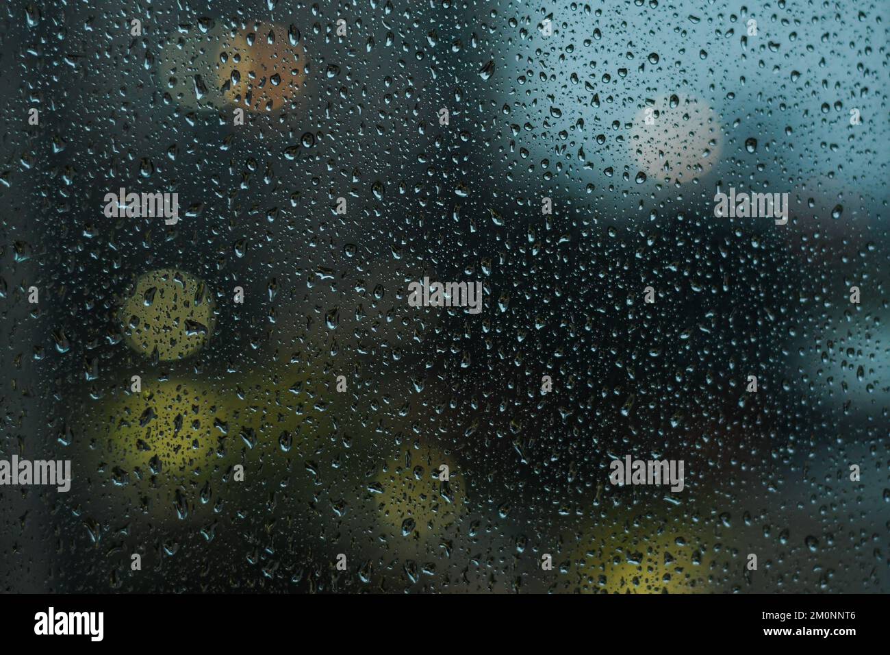 Raindrops falling on the window Stock Photo - Alamy