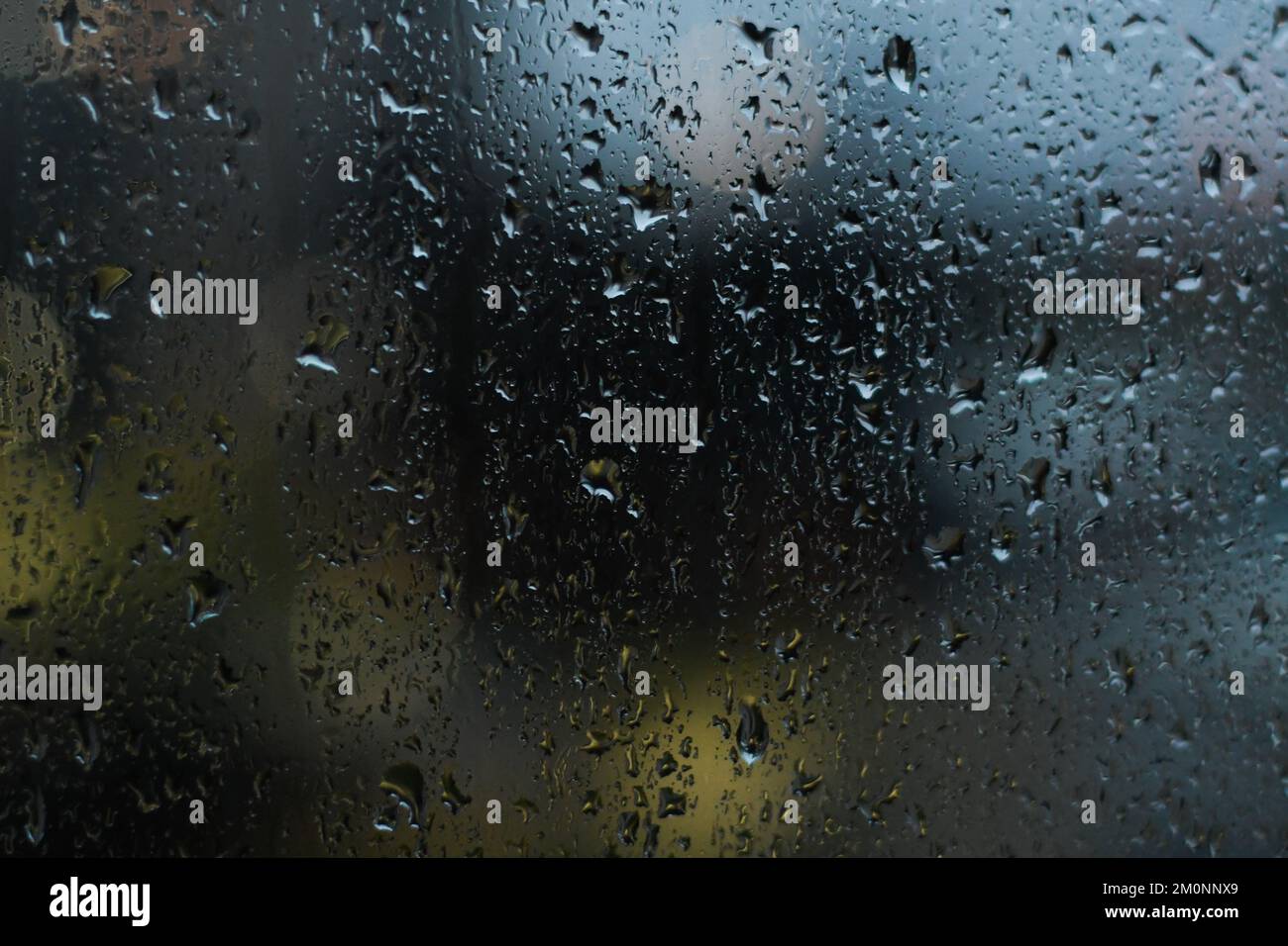 Raindrops falling on the window Stock Photo - Alamy