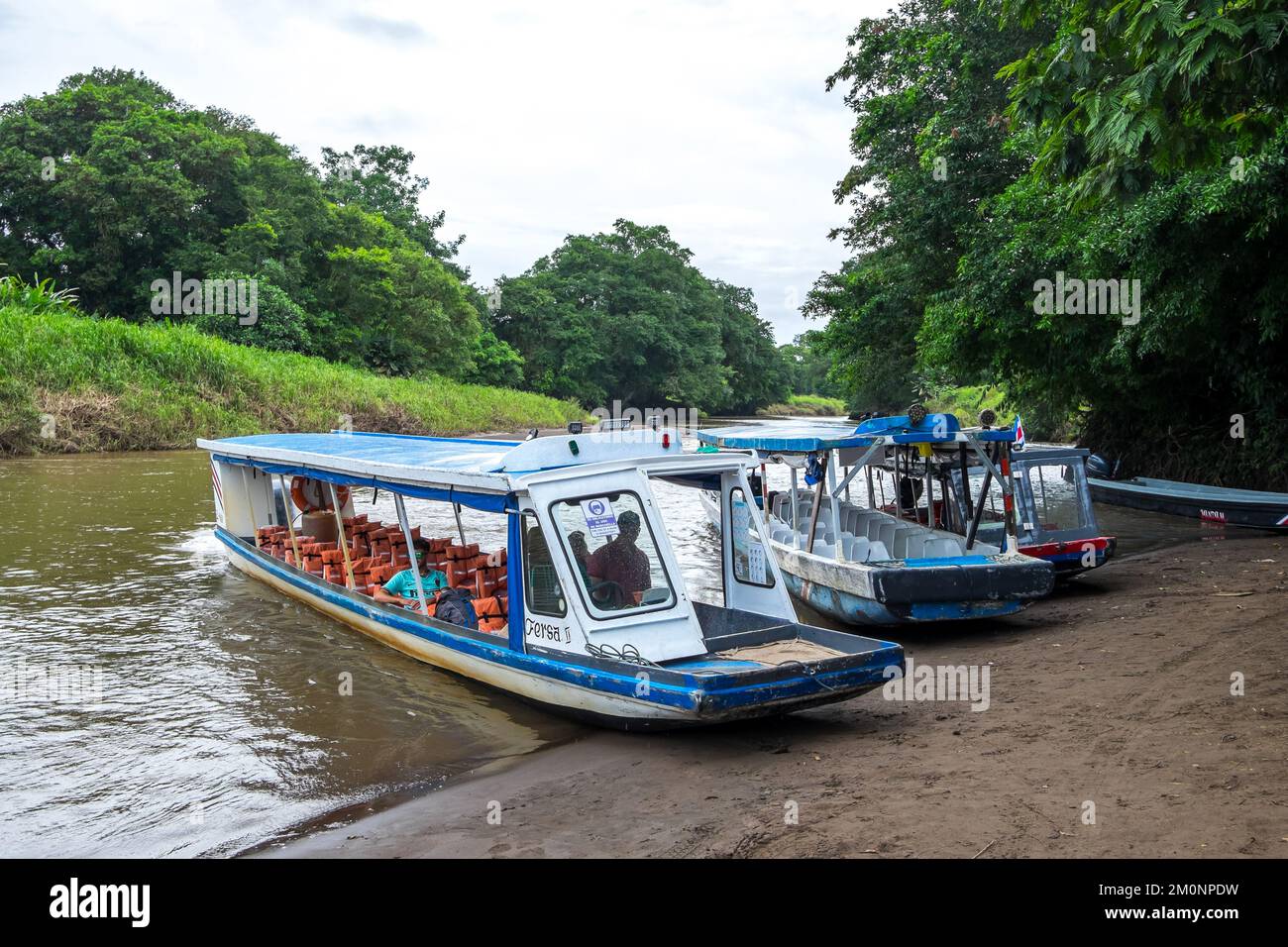 River transport boats at the La Pavona pier in Costa Rica Stock Photo ...