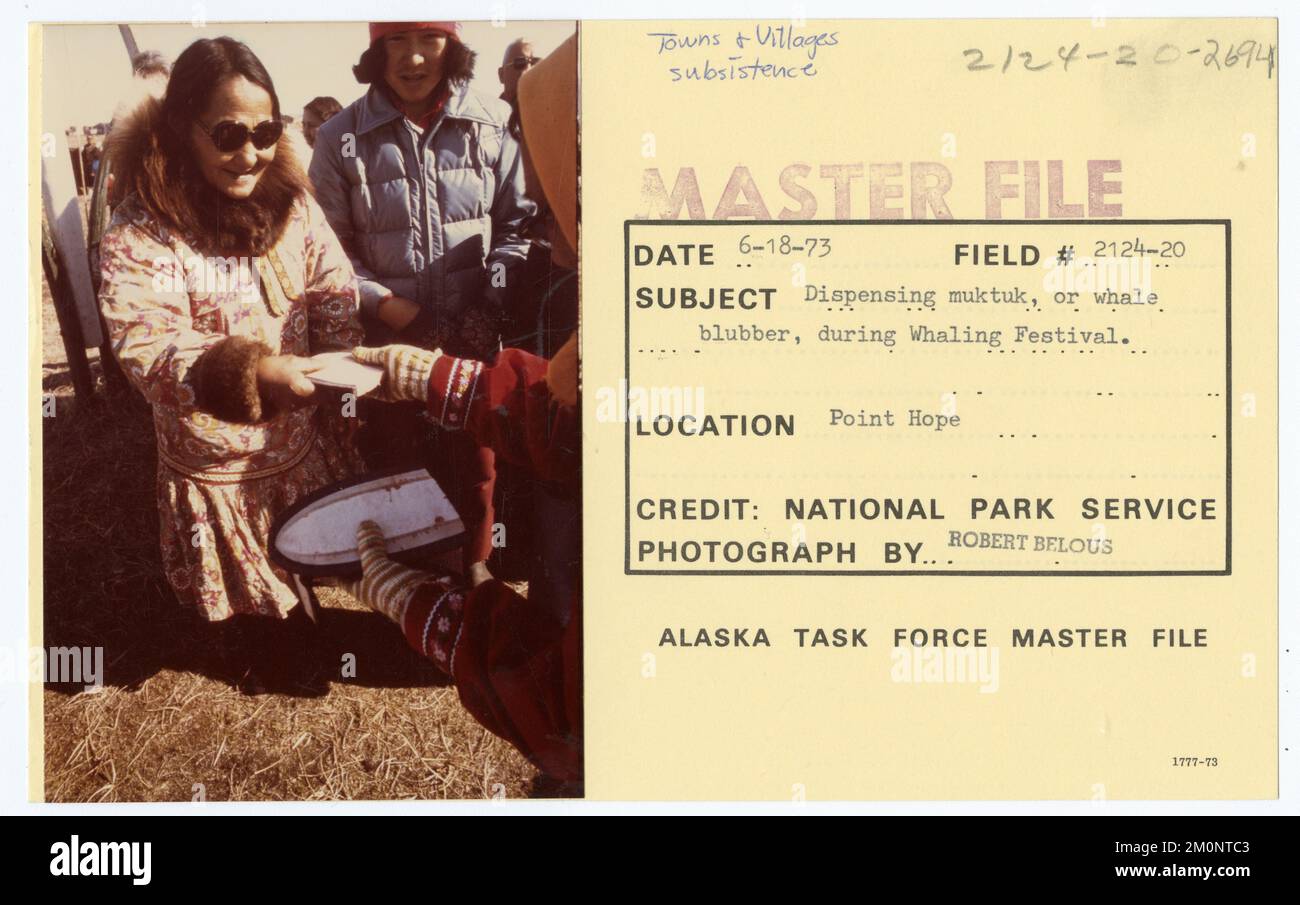 Dispensing muktuk, or whale blubber, during Whaling Festival. Alaska ...