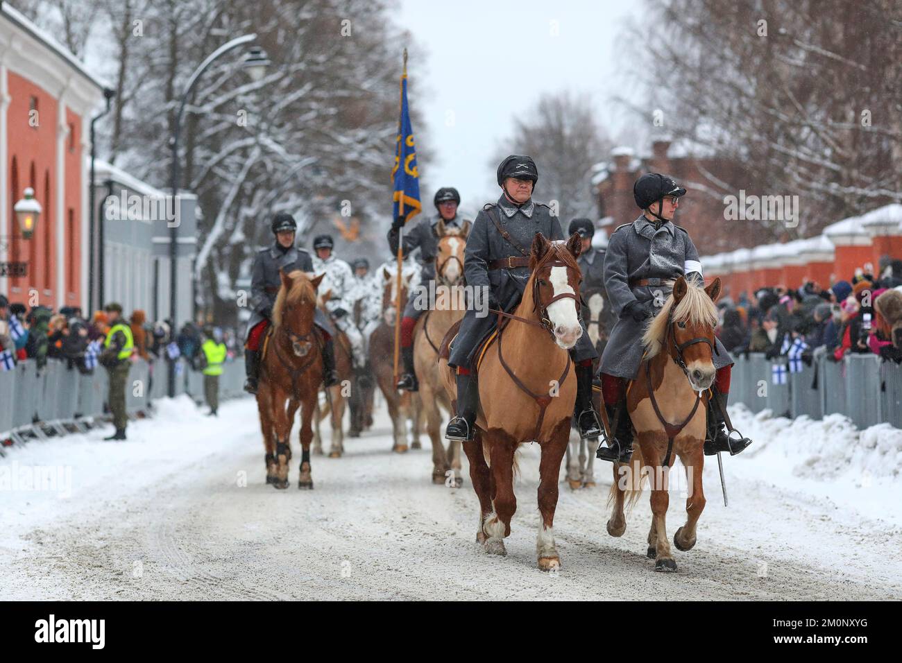 Soldiers on horseback march during the event. The Finnish Defence ...