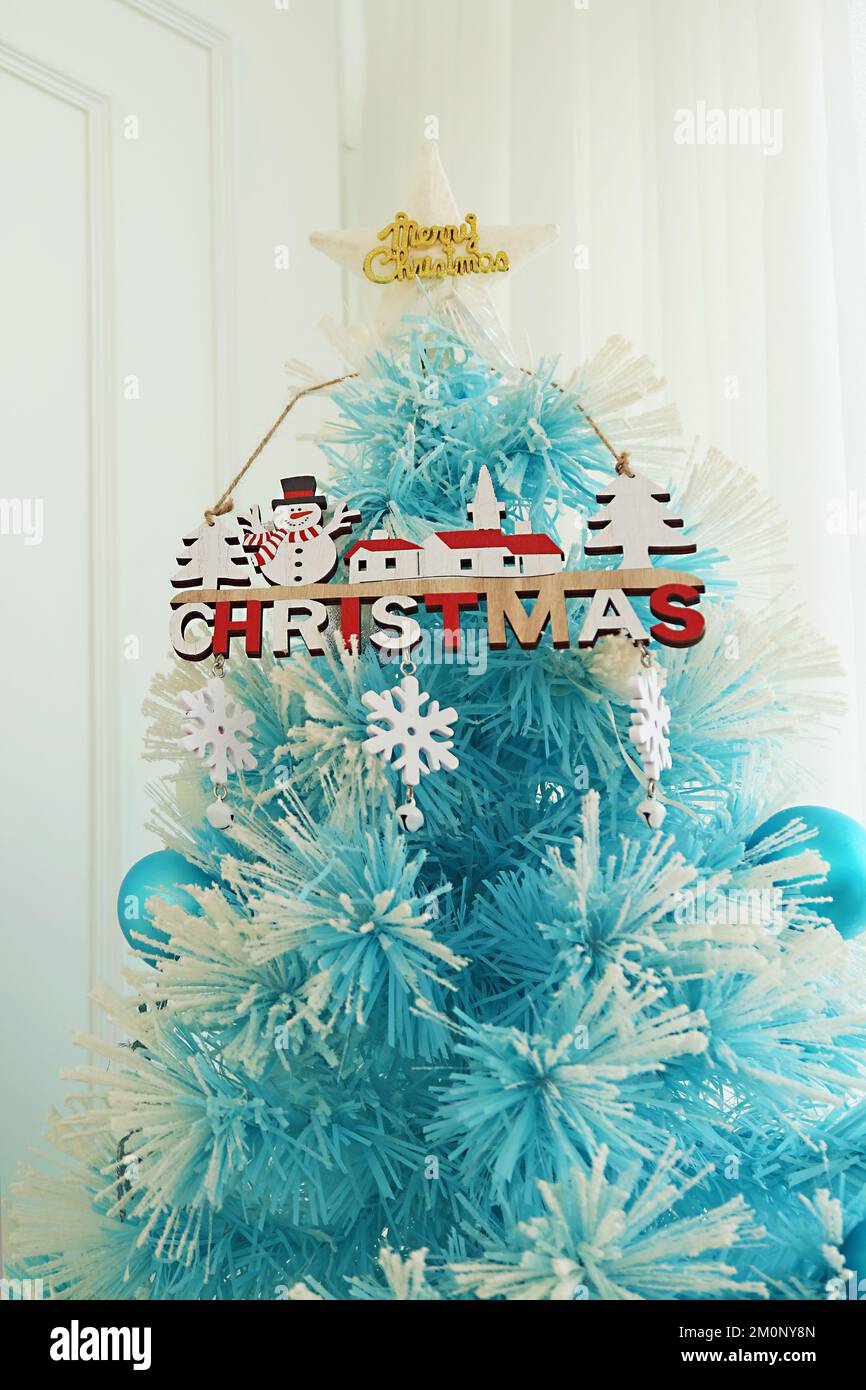 Gorgeous Light Blue Christmas Tree in White Room Stock Photo - Alamy
