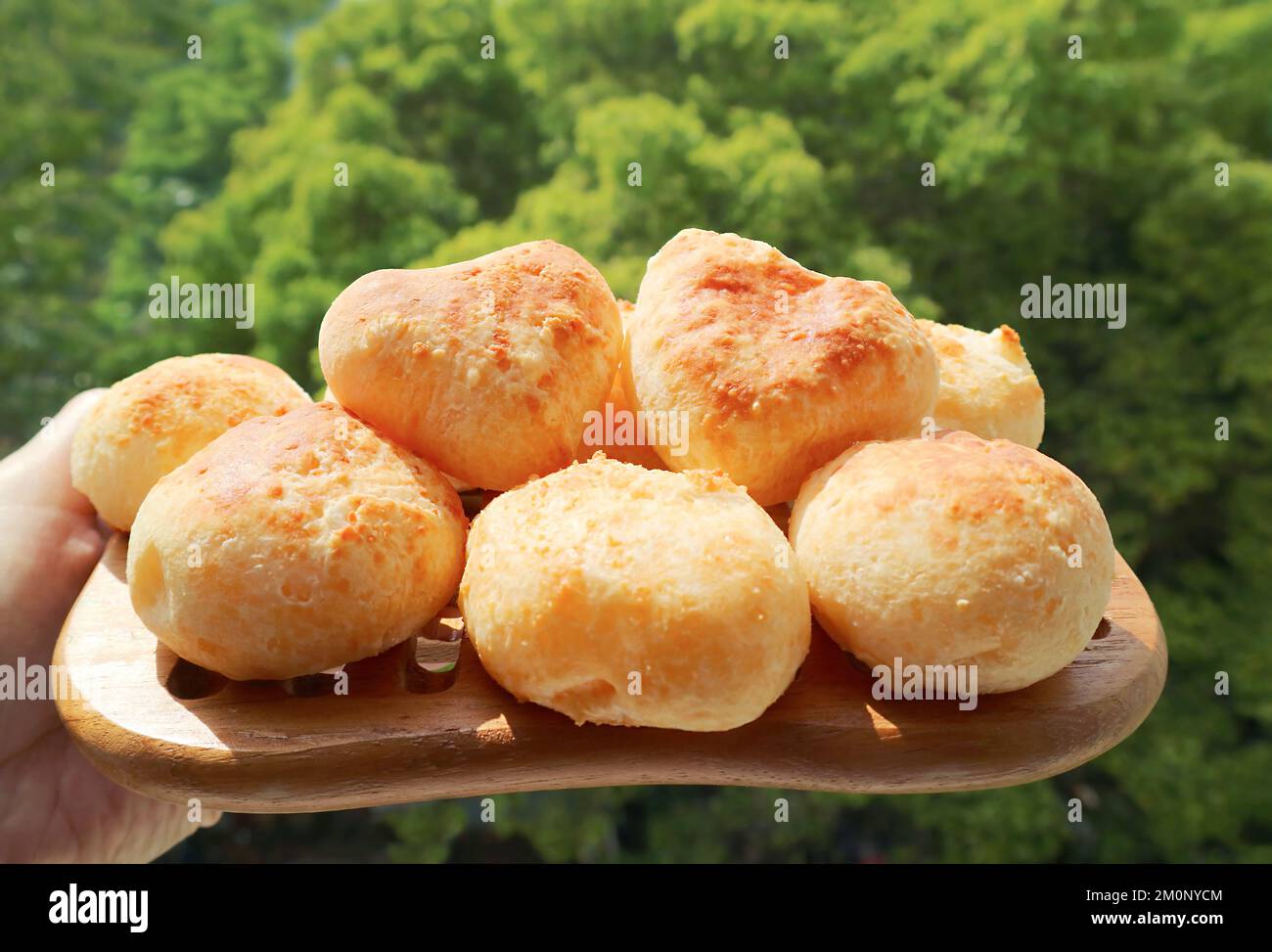 Heap of Freshly Baked Pao de Queijo or Brazilian Cheese Breads, with a ...