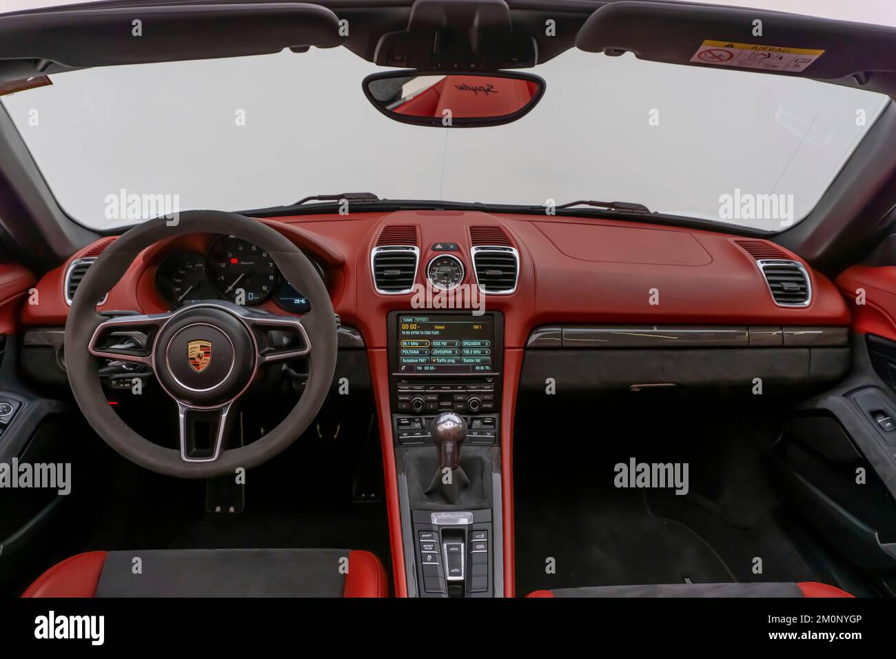 The view of a Porsche Boxster Spyder's red dashboard Stock Photo - Alamy
