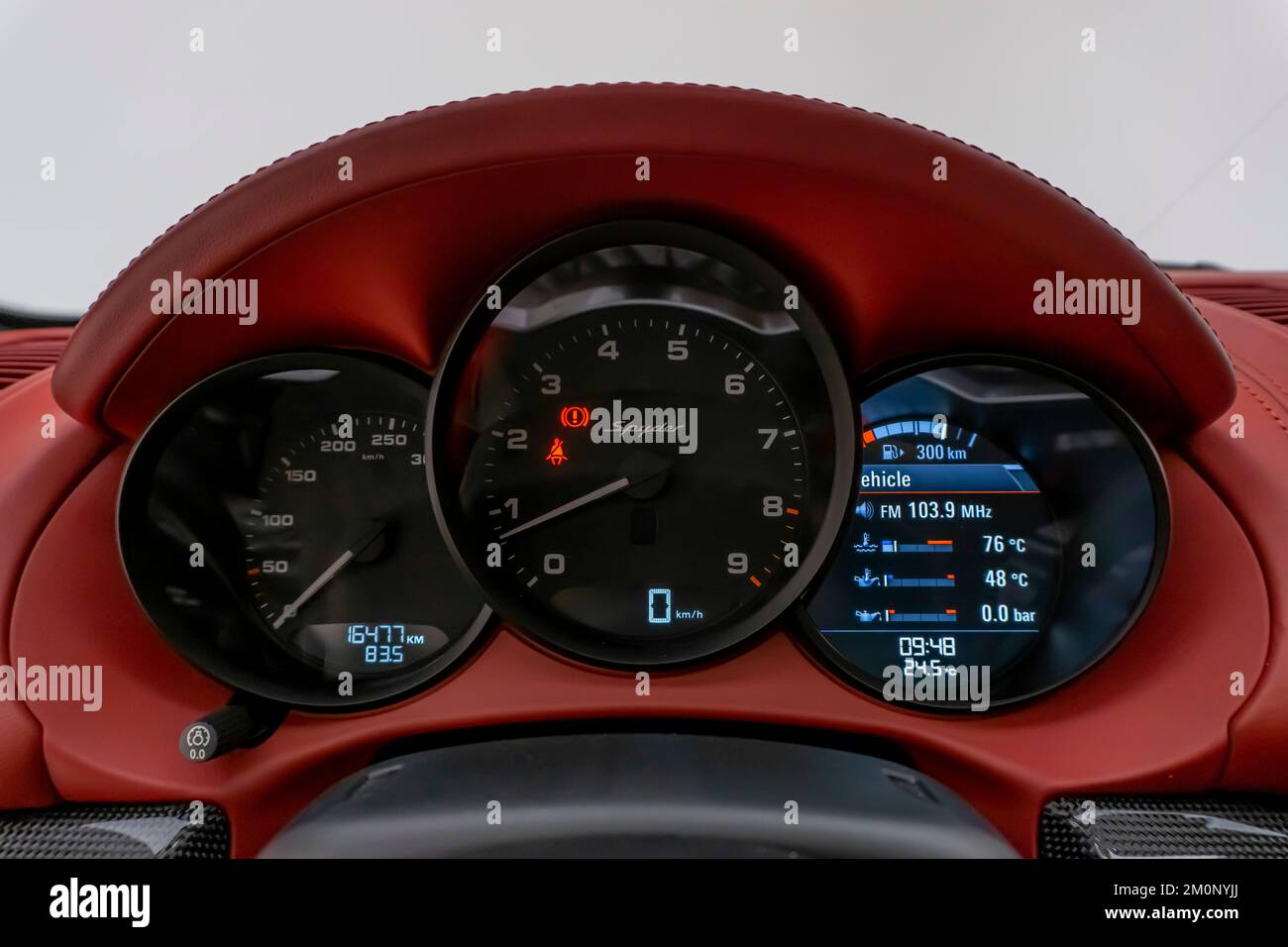The view of a Porsche Boxster Spyder red leather gauge cluster Stock ...