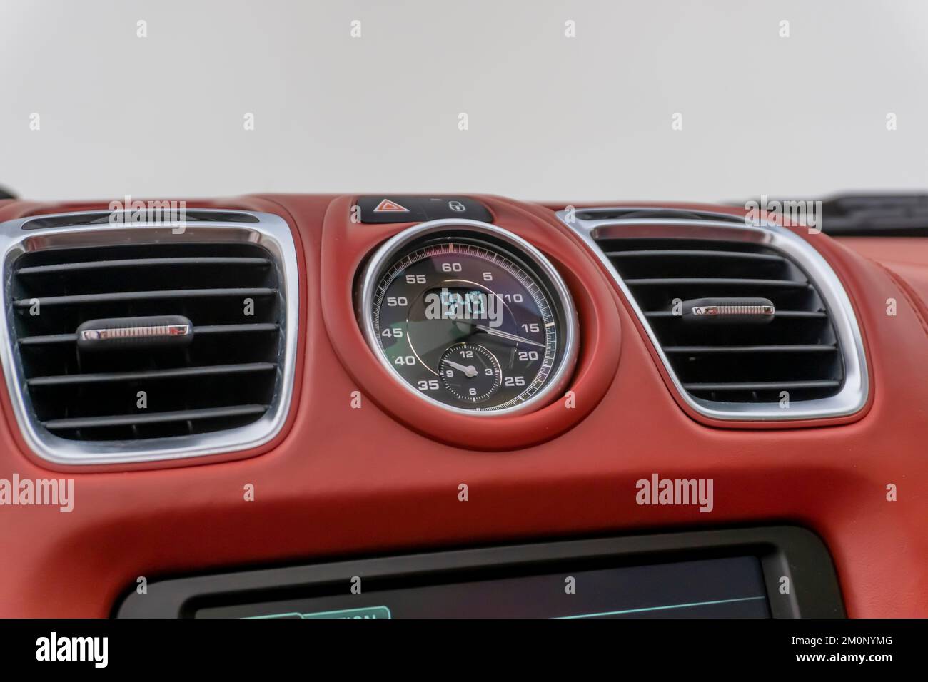 The Porsche Boxster Spyder red leather interior with a sport chrono ...