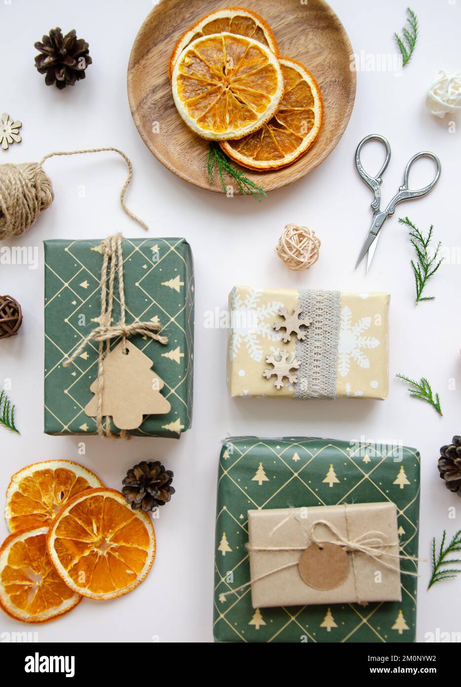 Hand crafted gifts on dark background with Christmas decorations ...