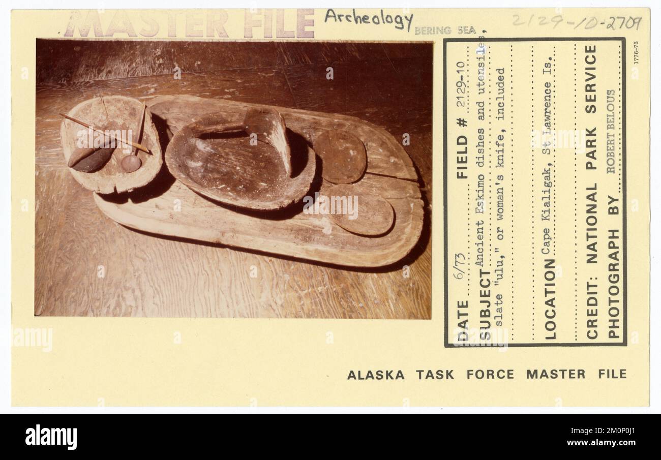 Ancient Eskimo dishes and utensils, slate "ulu", or woman's knife ...