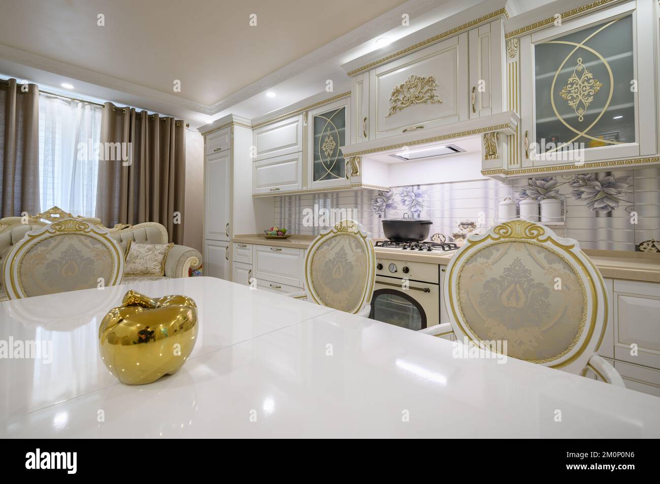 Renovated Interior of rich classic white kitchen Stock Photo - Alamy