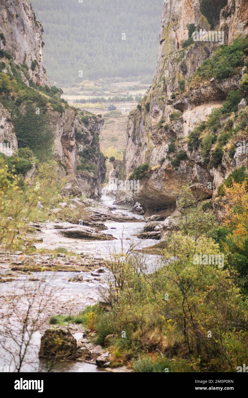 Landscape of a rocky riverbed on a rainy day Stock Photo - Alamy
