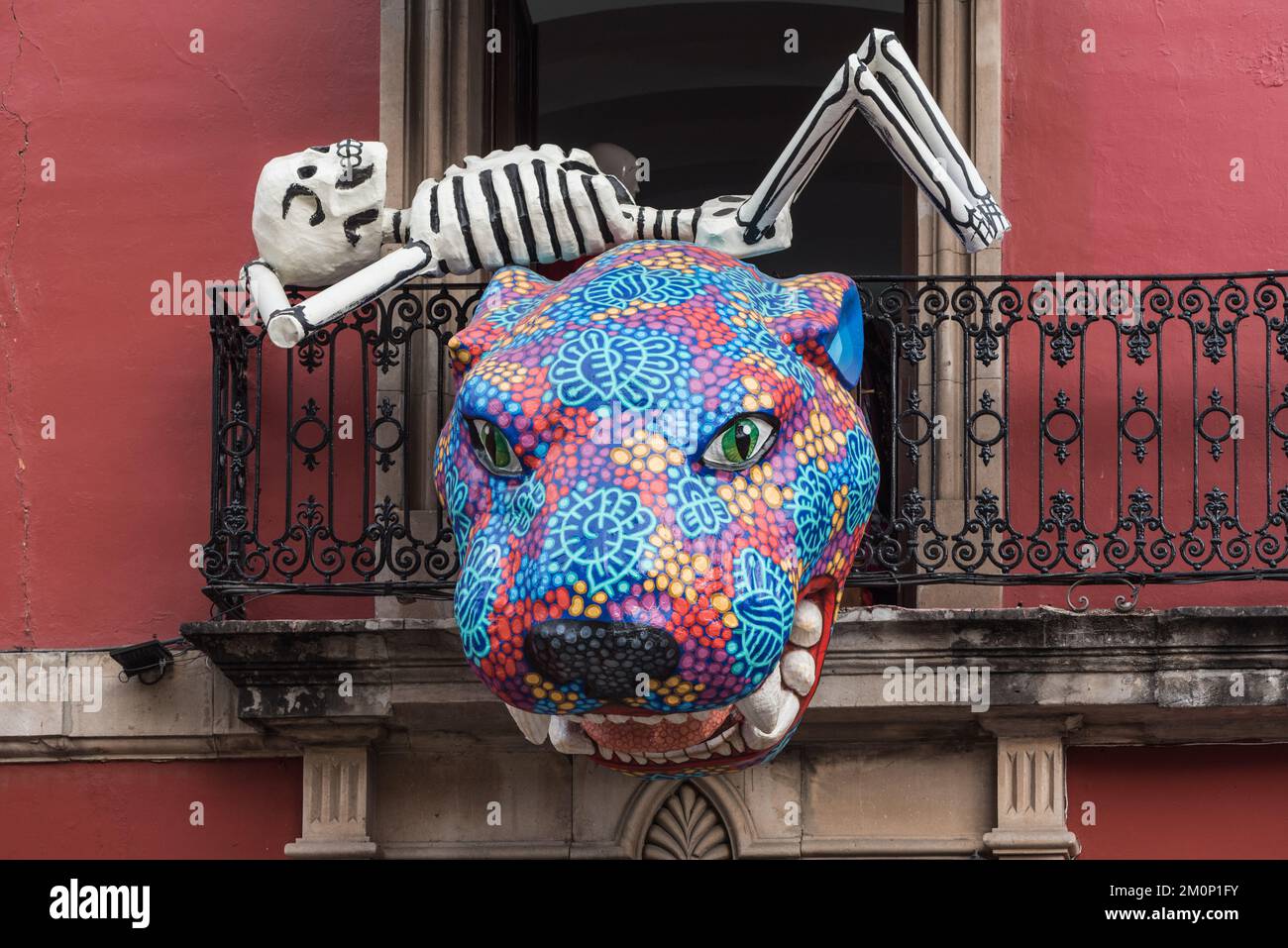 Coloured Jaguar head and skeleton (day of the dead), Oaxaca, Mexico ...