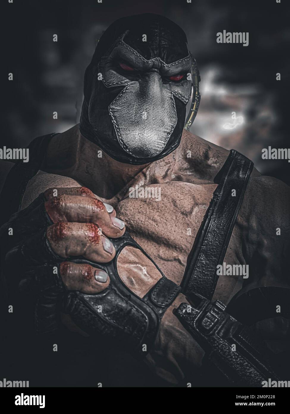 A vertical closeup of the Bane DC comics super villain on blurred ...
