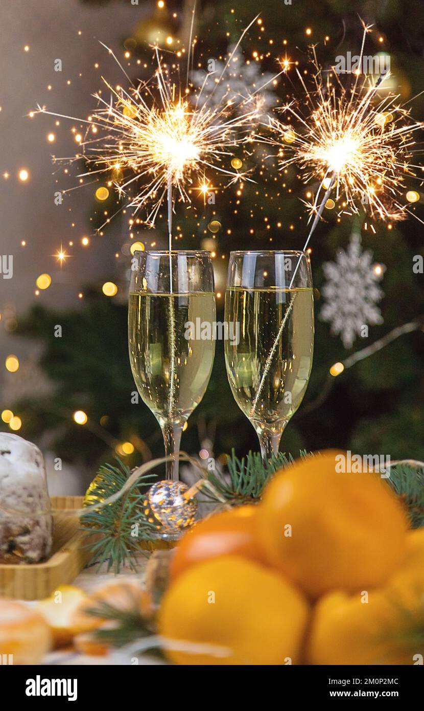 Champagne on the Christmas table. Selective focus Stock Photo - Alamy