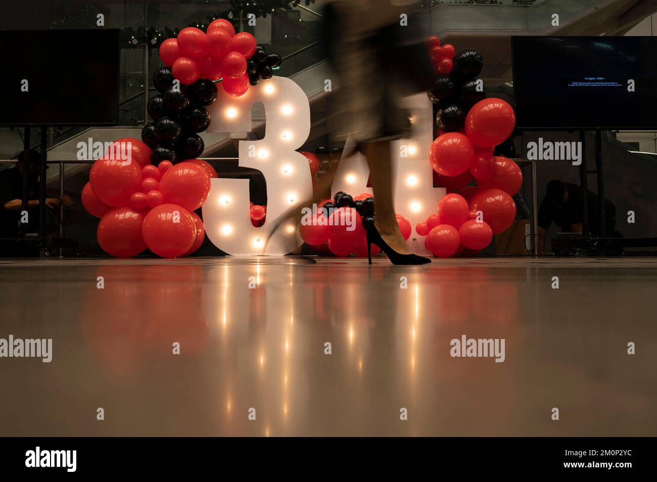 Atlanta, Georgia, USA. 6th Dec, 2022. A supporter walks past ...