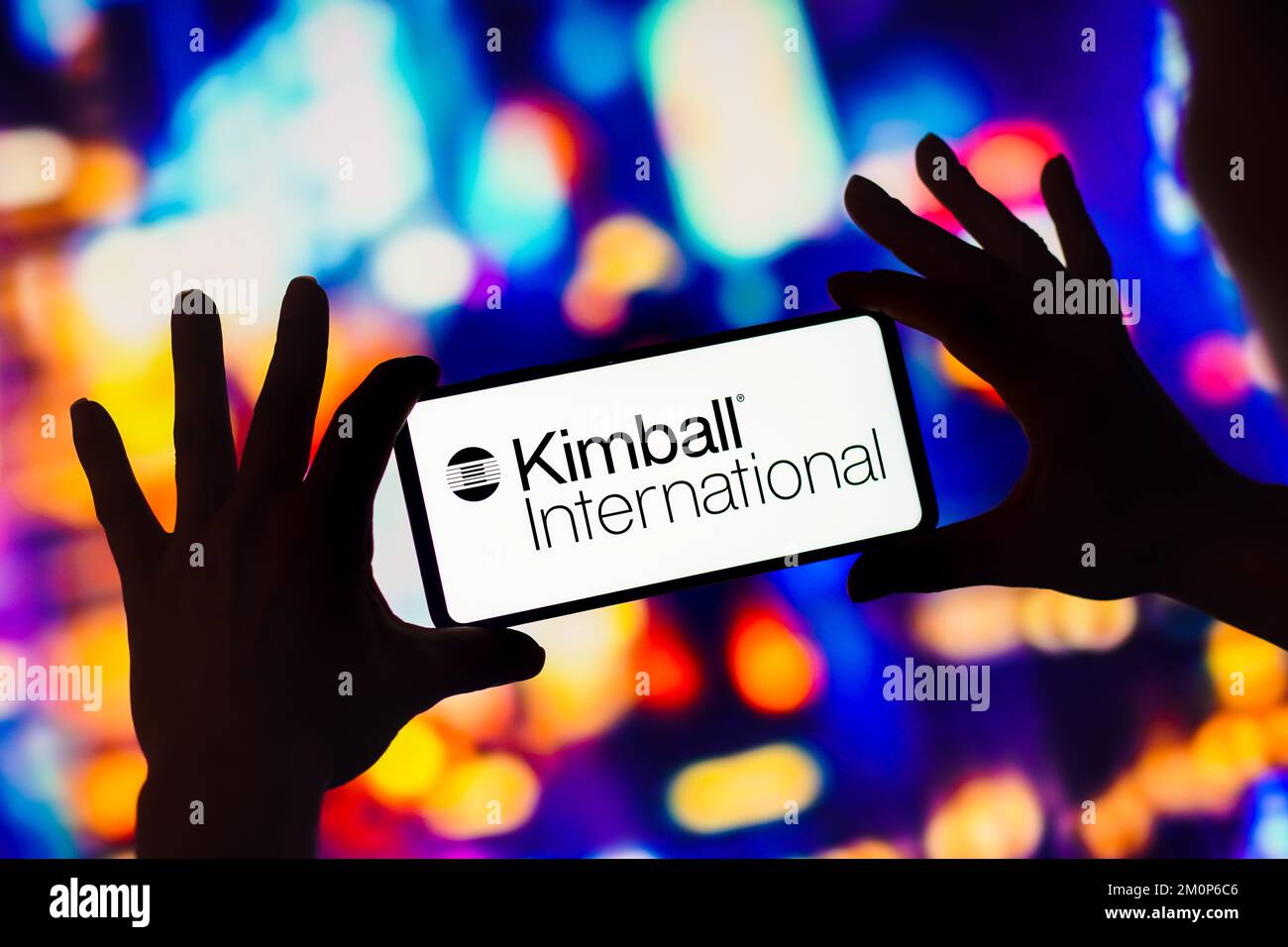 In this photo illustration, the Kimball International logo is displayed ...
