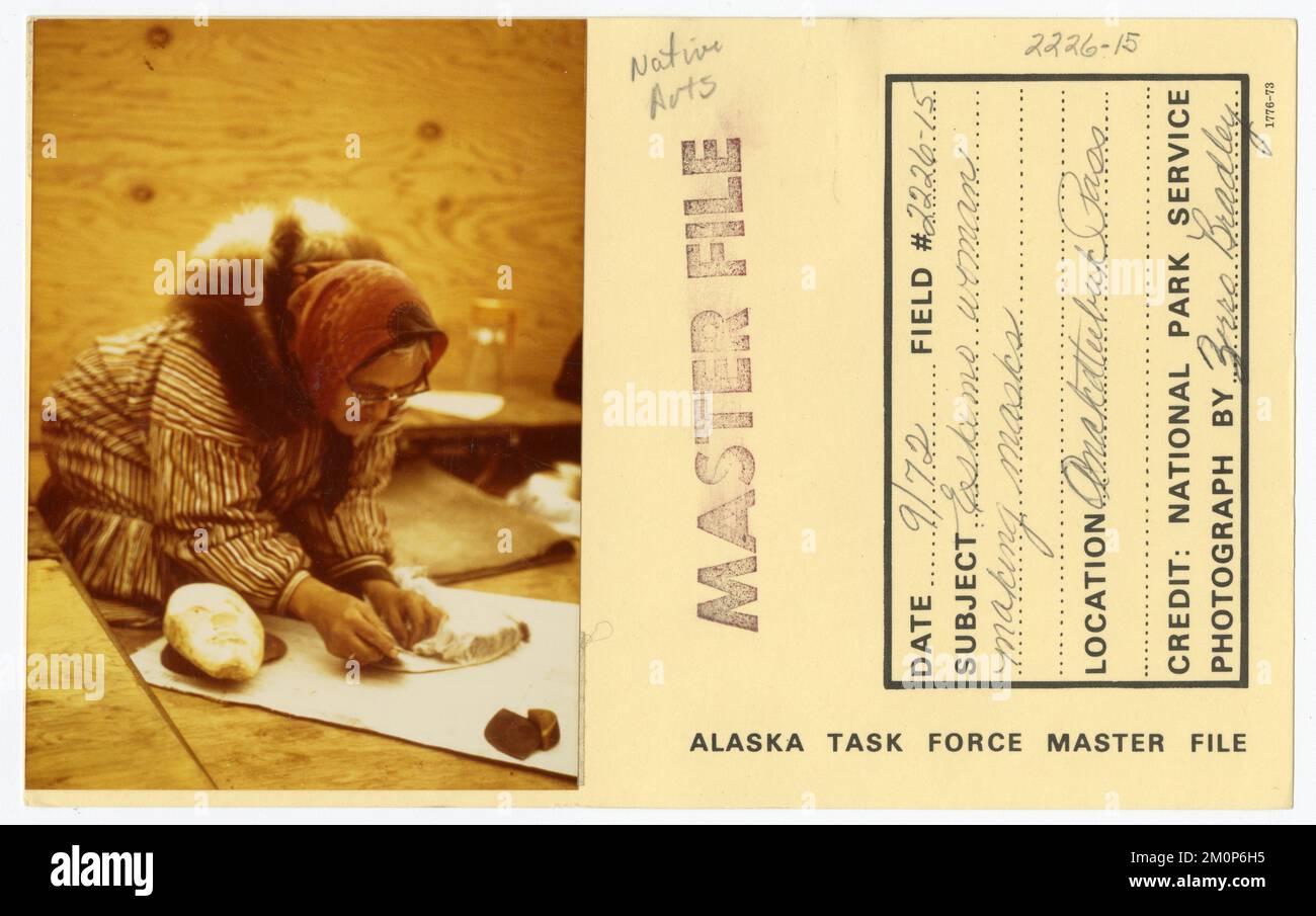 Eskimo woman making masks. Alaska Task Force Photographs Stock Photo ...