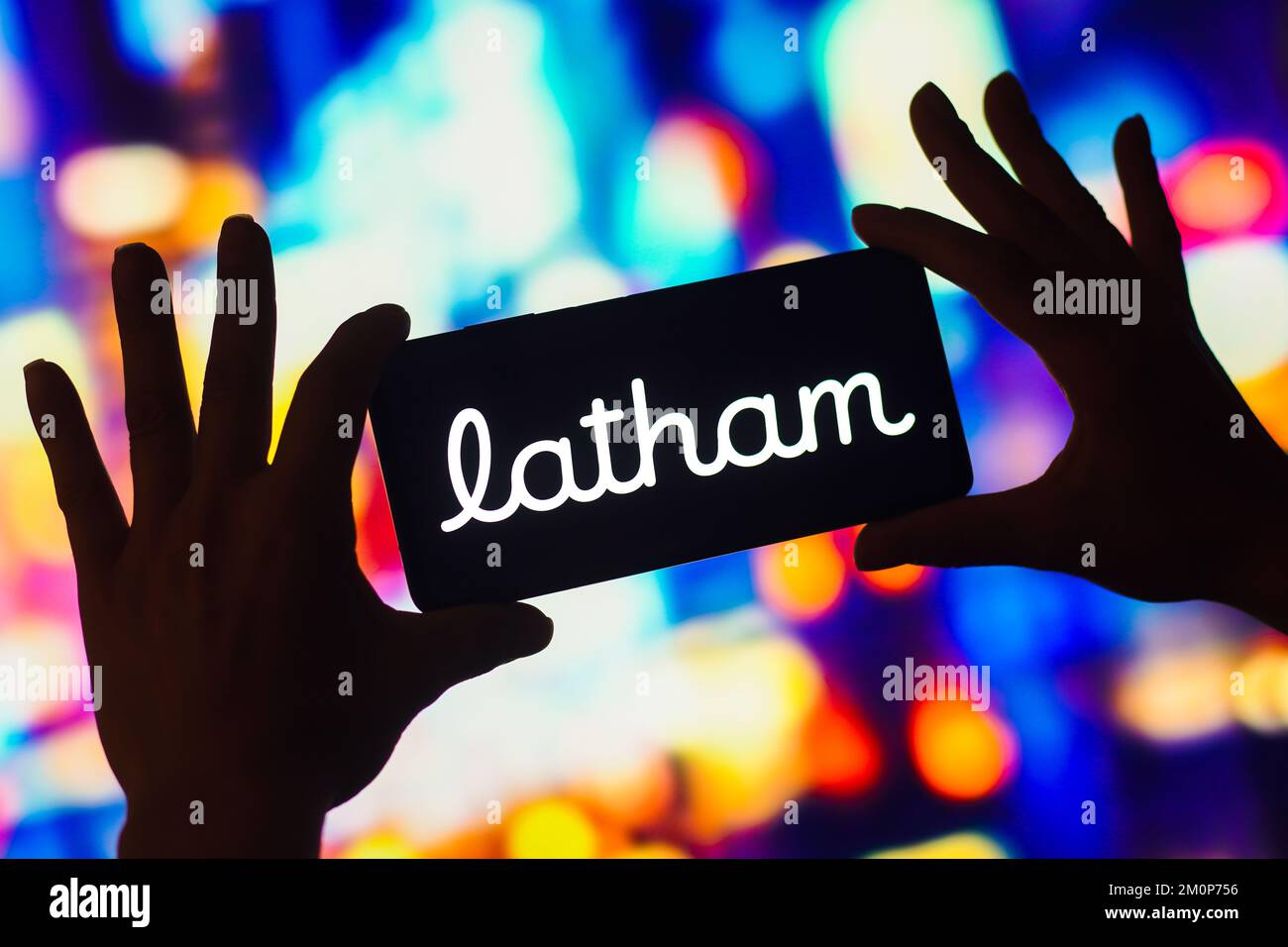 In this photo illustration, the Latham Group logo is displayed on a ...