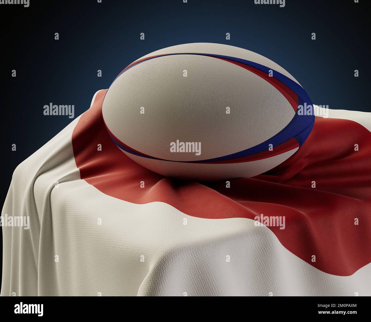 A regular rugby ball resting on a Japan flag draped over a plinth on an ...
