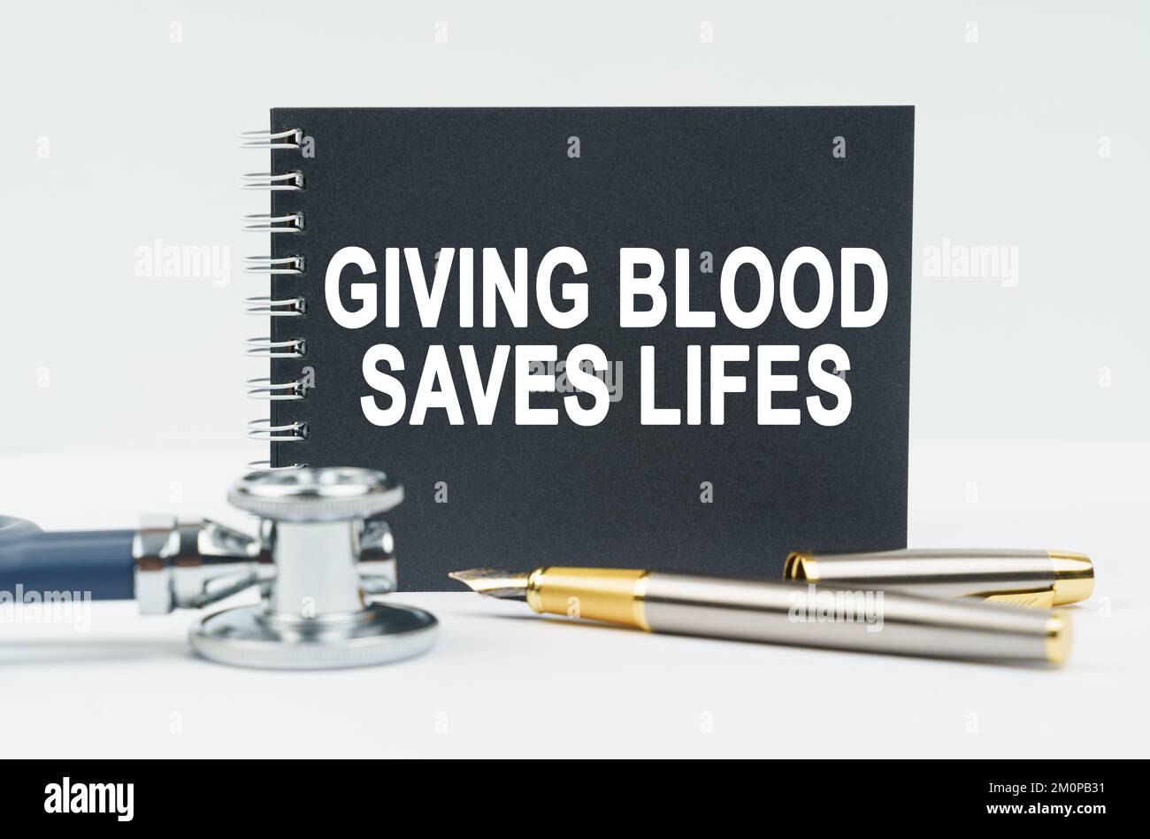 Medicine and health concept. On a white background lies a stethoscope ...