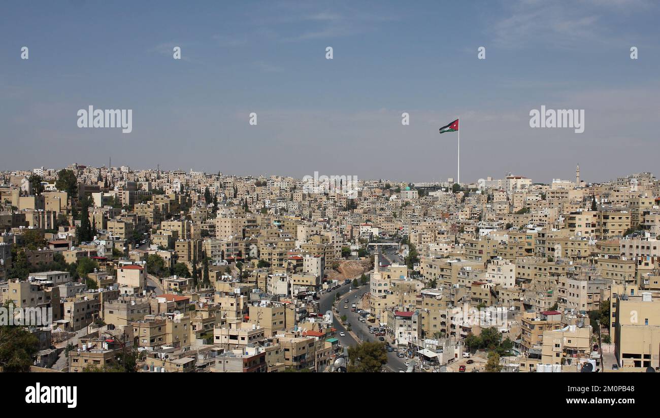 Huge Jordan flag in midtown Amman, landscape view of clear sky ...