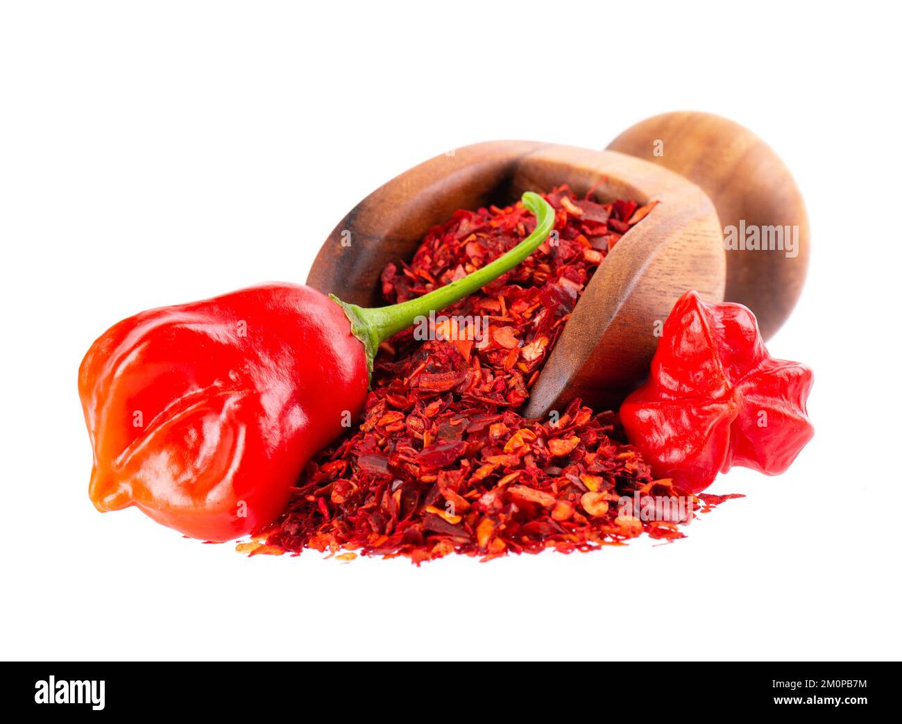 Fresh and dry ground red chili peppers isolated on white background ...