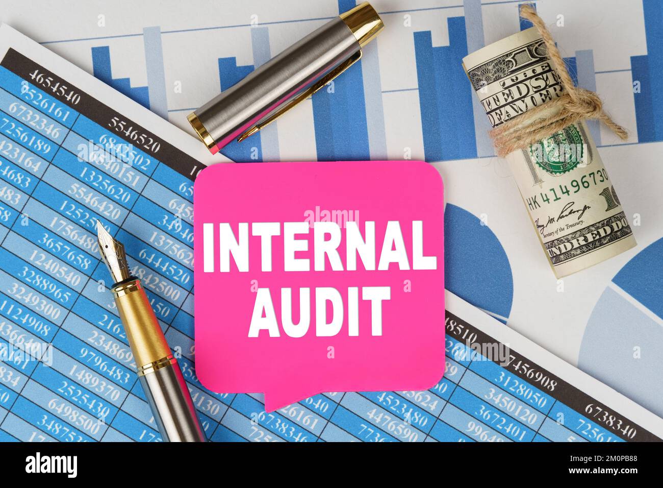 Business and finance concept. Among the financial statements and charts ...