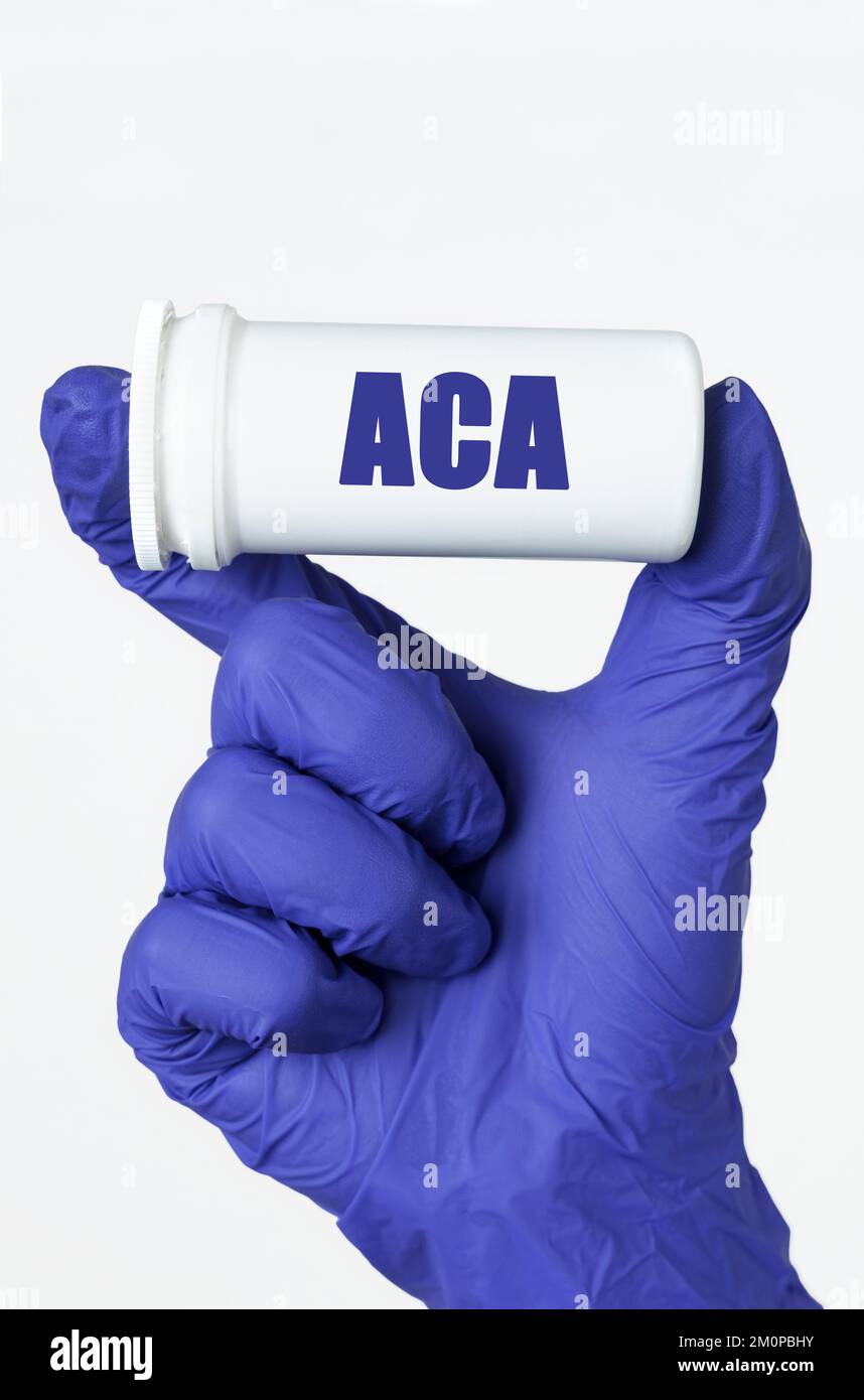 Medicine and health concept. The doctor has a box of pills in his hands ...