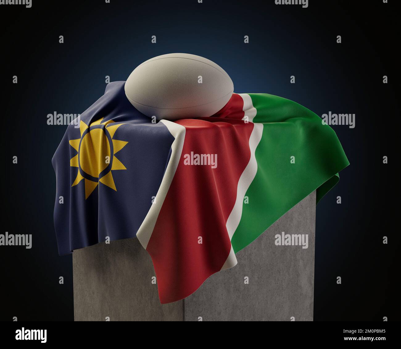 A regular rugby ball resting on a Namibia flag draped over a plinth on ...