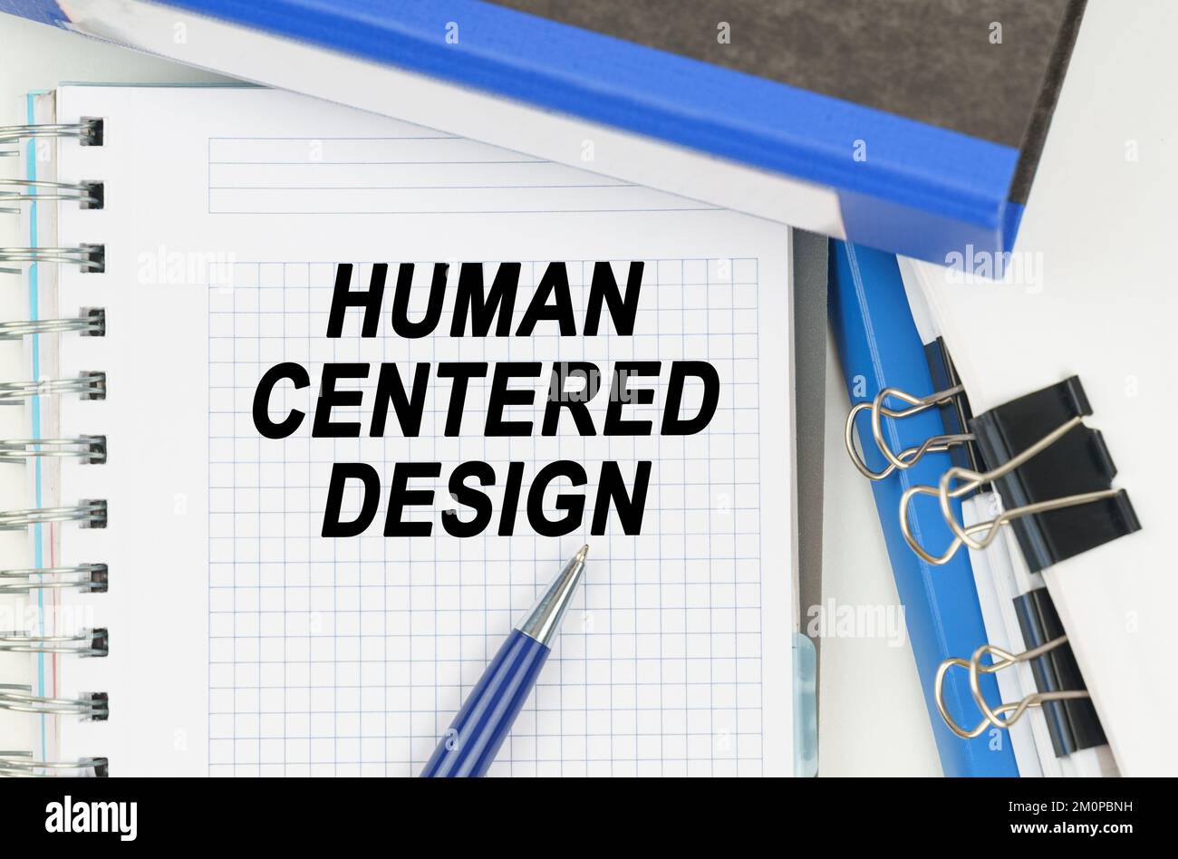 Business and Economics. Among the documents, folders, a notebook with ...