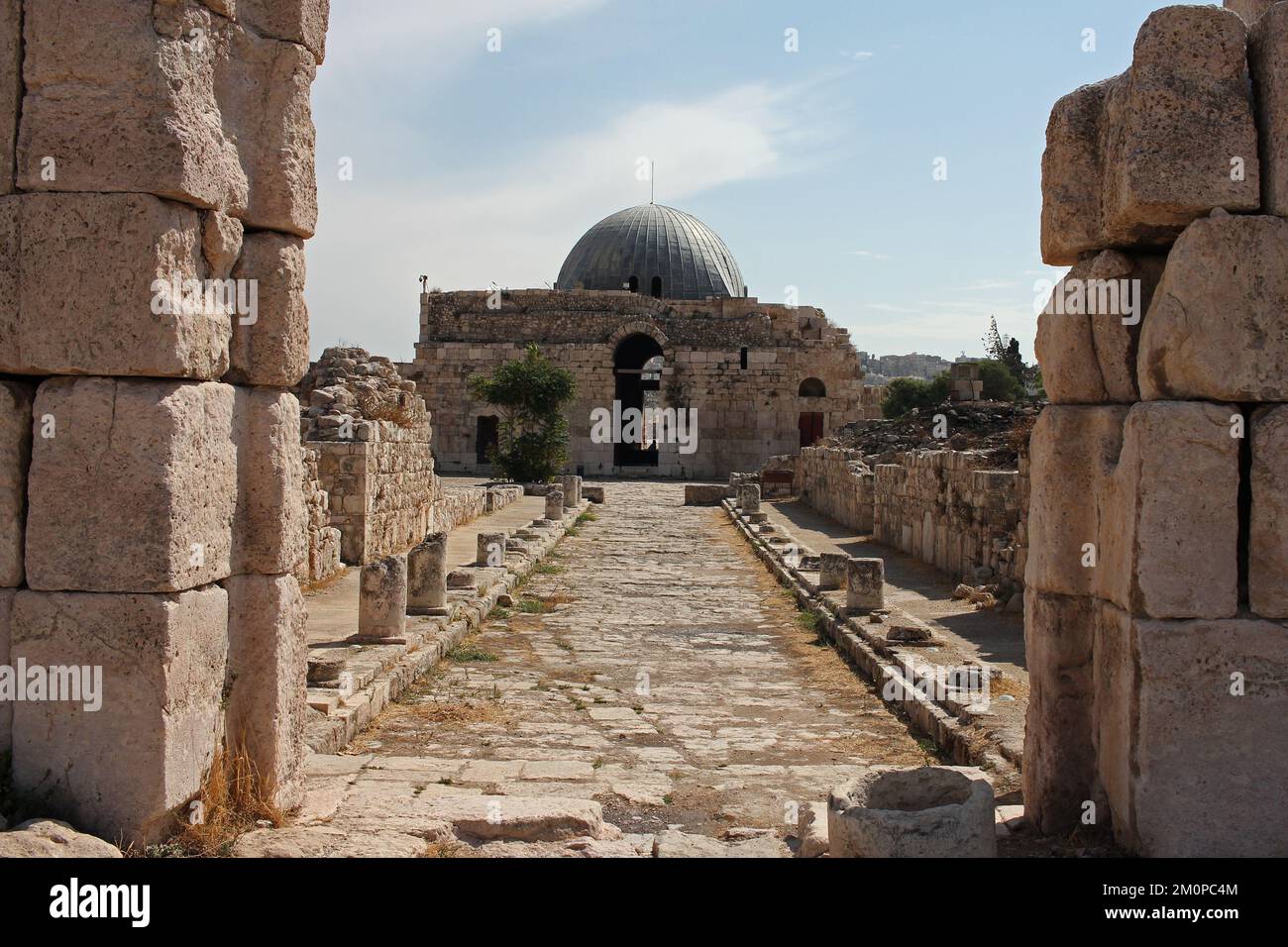 Colonnaded street towards the Umayyad Palace at the old roman citadel ...