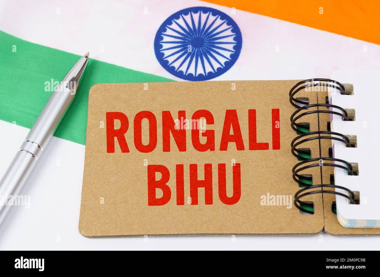 Holidays in India. Against the background of the flag of India lies cardboard with the ...