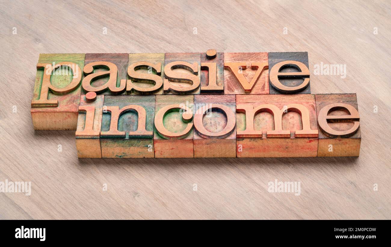 passive income - word abstract in letterpress wood type, business and ...