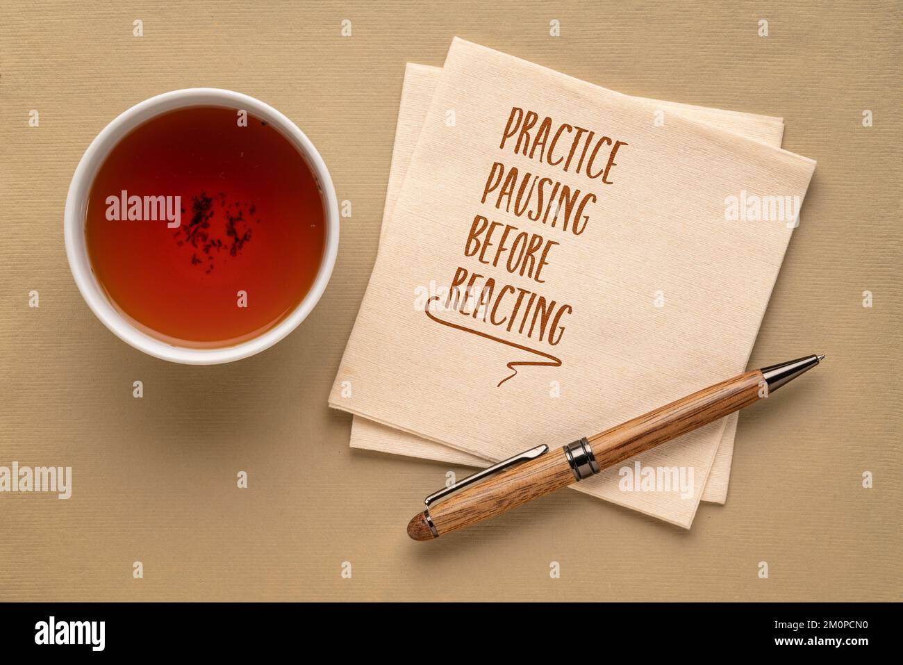 practice pausing before reacting - inspirational note on a napkin with ...