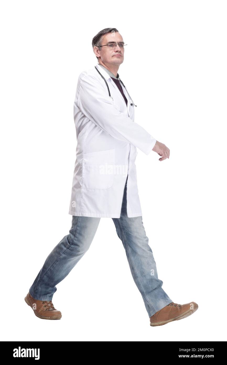 qualified doctor with stethoscope going forward. isolated on a white ...